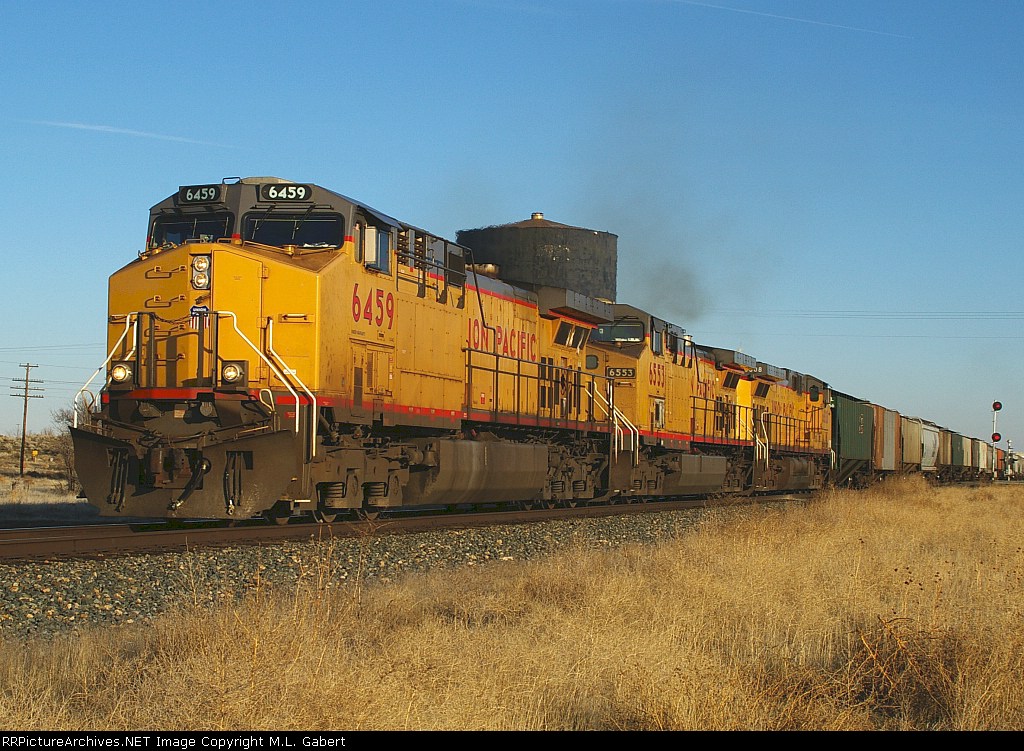 UP 6459 passes the old watertower
